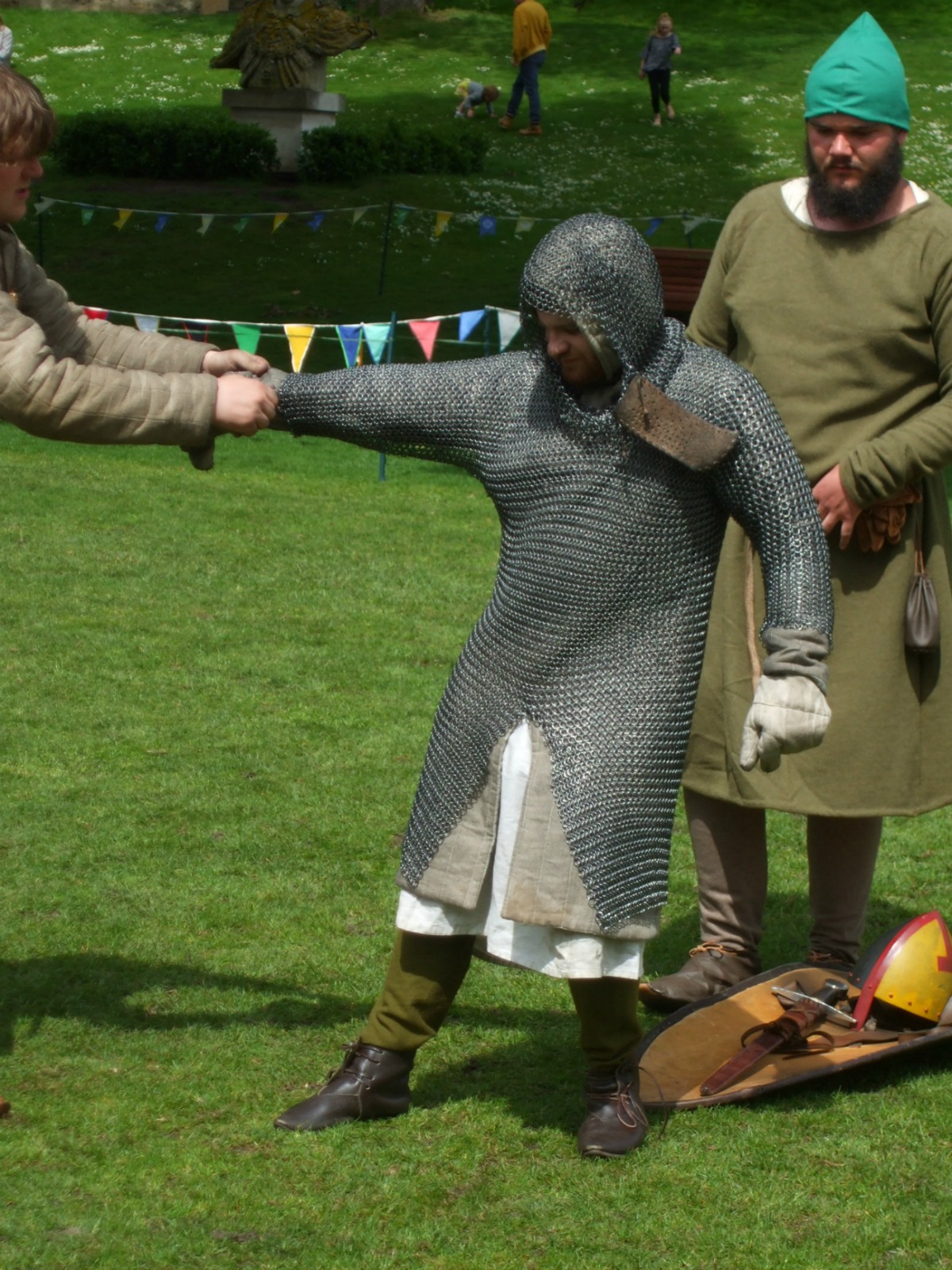 Dressing a knight chain mail – Millie Thom